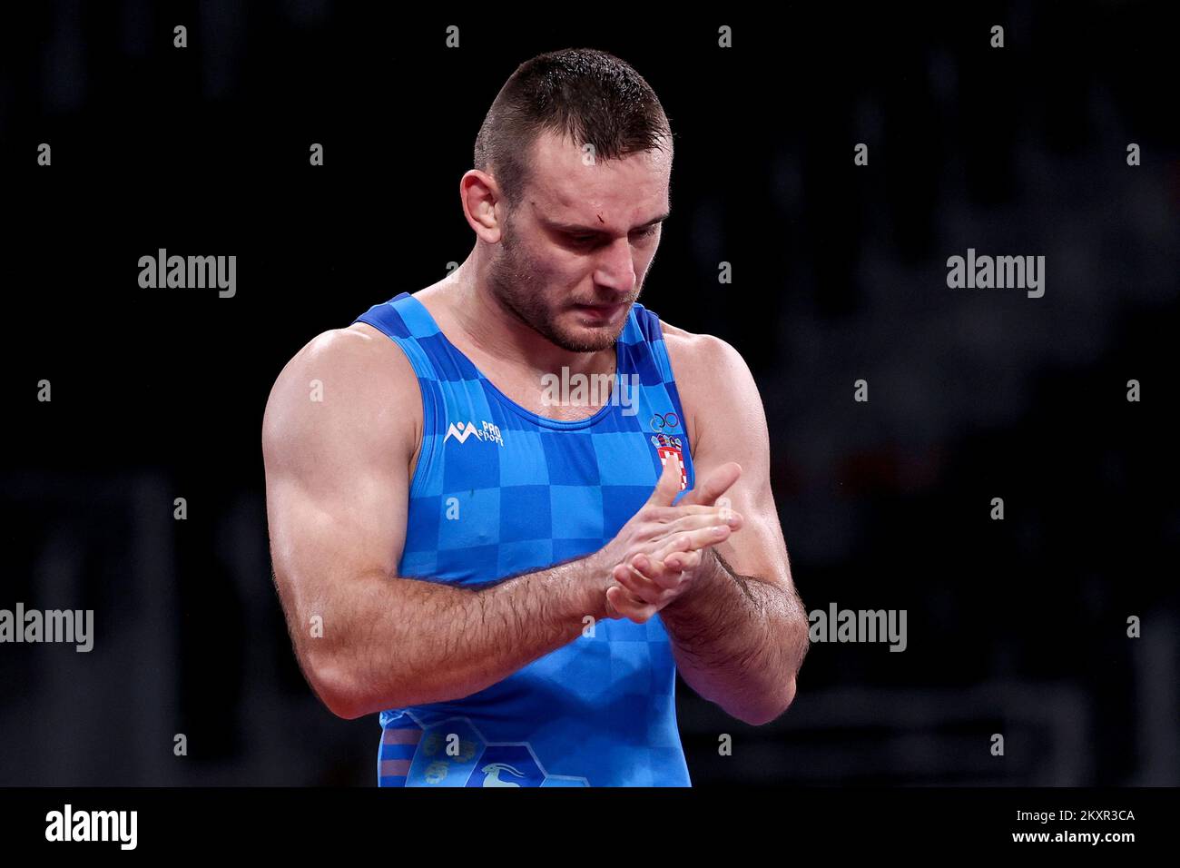 Ivan Huklek of Team Croatia competes against Rustam Assakalov of Team ...