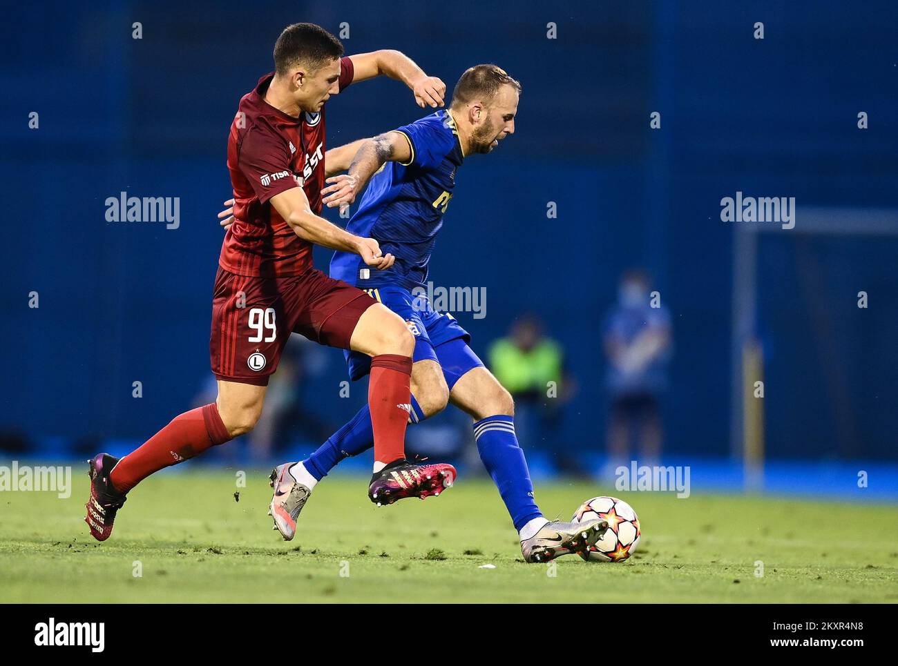 Croatia, Zagreb - AUGUST 4, 2021 Bartosz Slisz, Josip Misic during UEFA ...