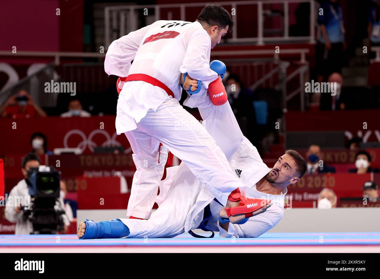 Ivan Kvesic of Team Croatia and Sajjad Ganjzadeh of Team Iran compete ...