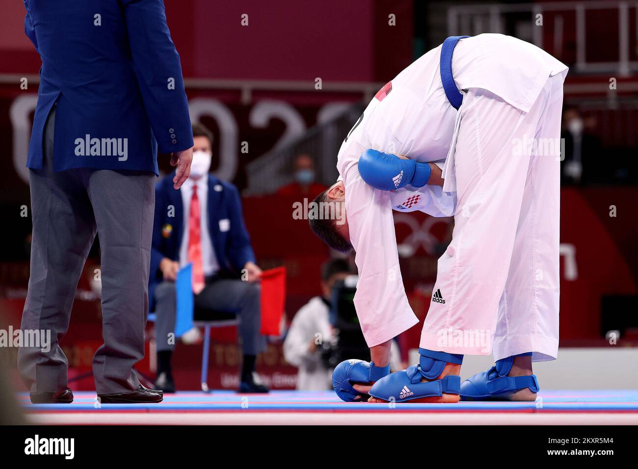 Ivan Kvesic of Team Croatia and Sajjad Ganjzadeh of Team Iran compete ...