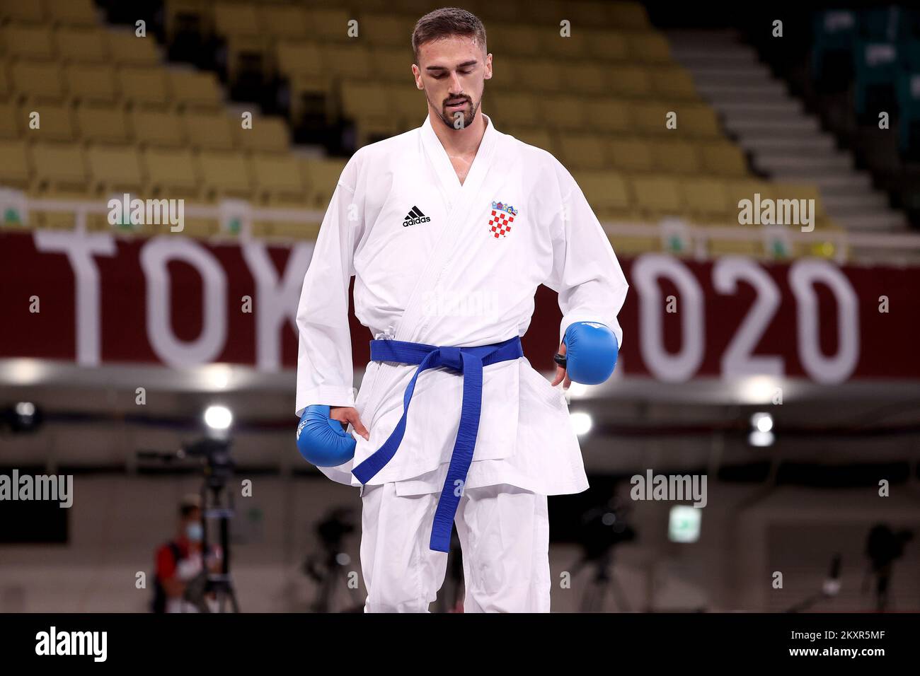 Ivan Kvesic of Team Croatia and Sajjad Ganjzadeh of Team Iran compete ...