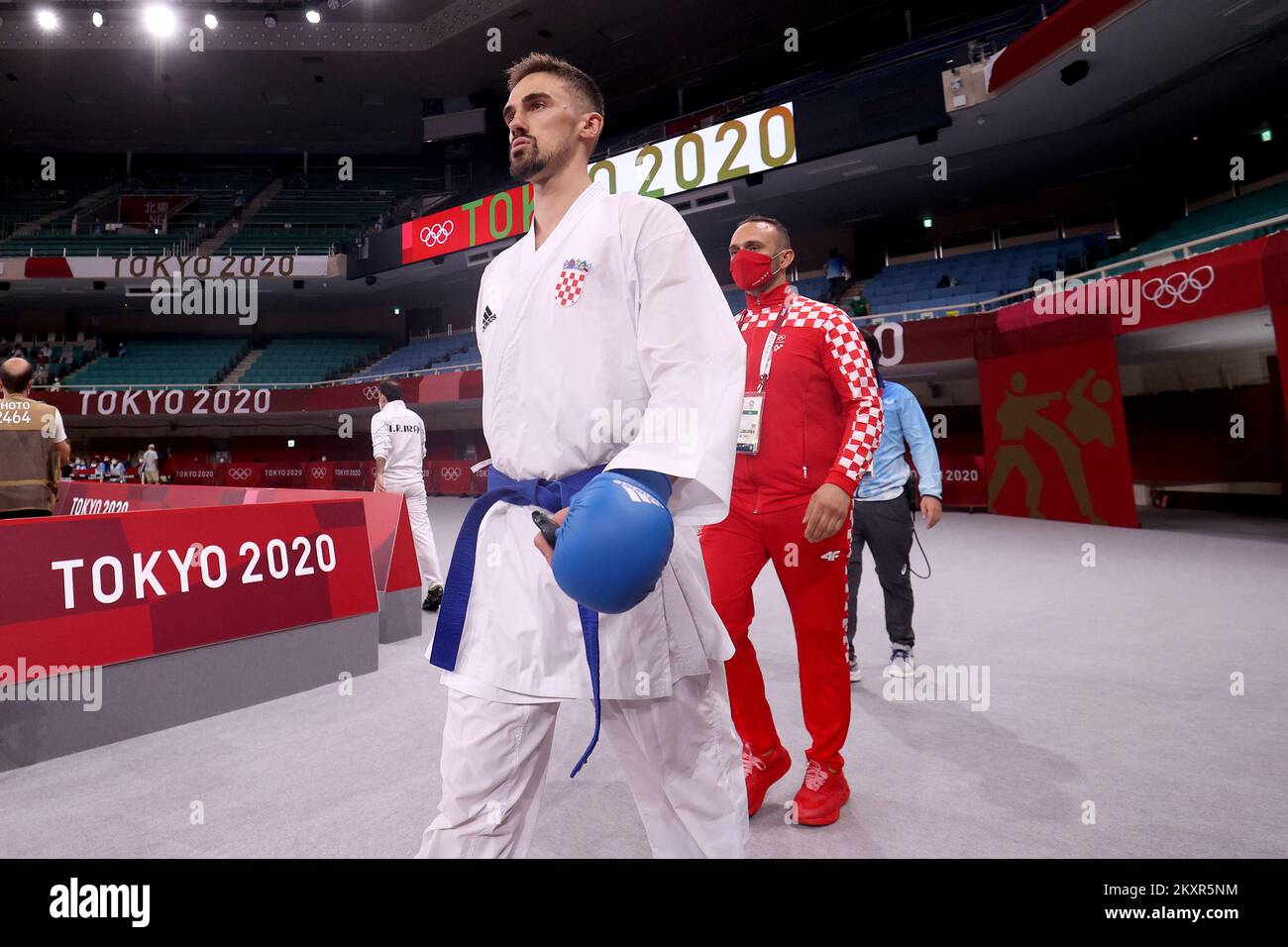 Ivan Kvesic of Team Croatia and Sajjad Ganjzadeh of Team Iran compete ...