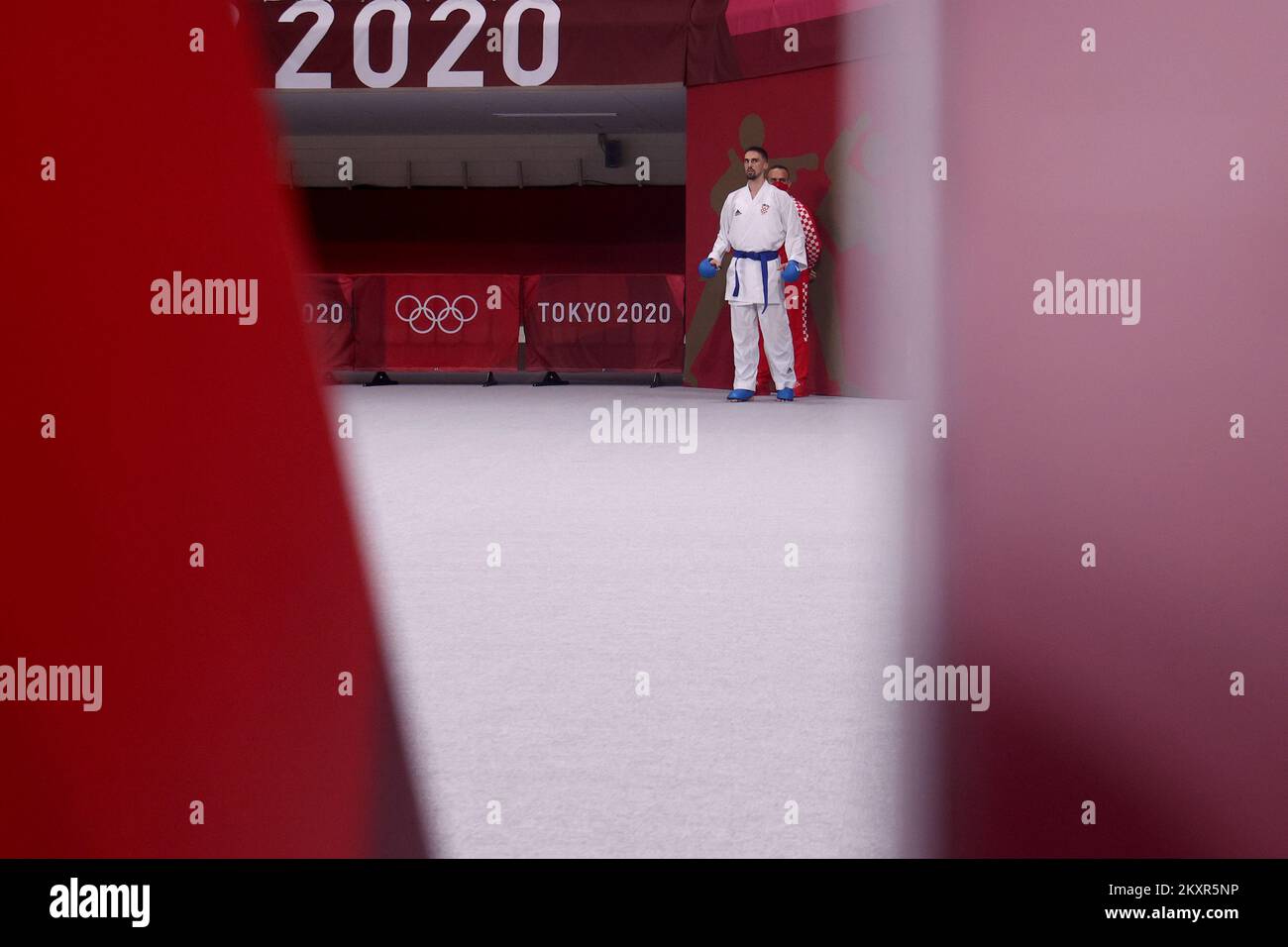 Ivan Kvesic of Team Croatia and Sajjad Ganjzadeh of Team Iran compete ...