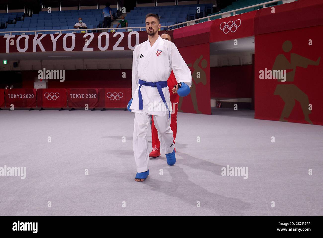 Ivan Kvesic of Team Croatia and Sajjad Ganjzadeh of Team Iran compete ...