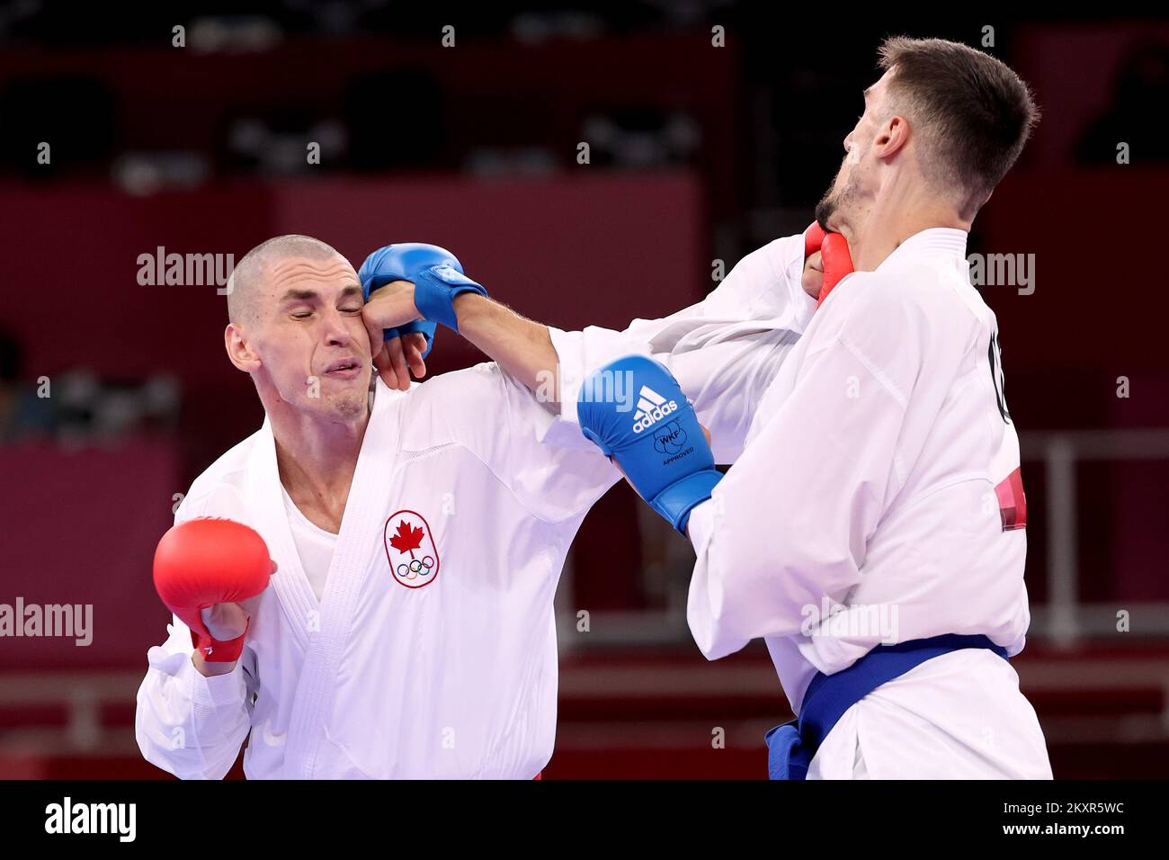 Ivan Kvesic of Team Croatia and Daniel Gaysinsky of Team Canada compete ...