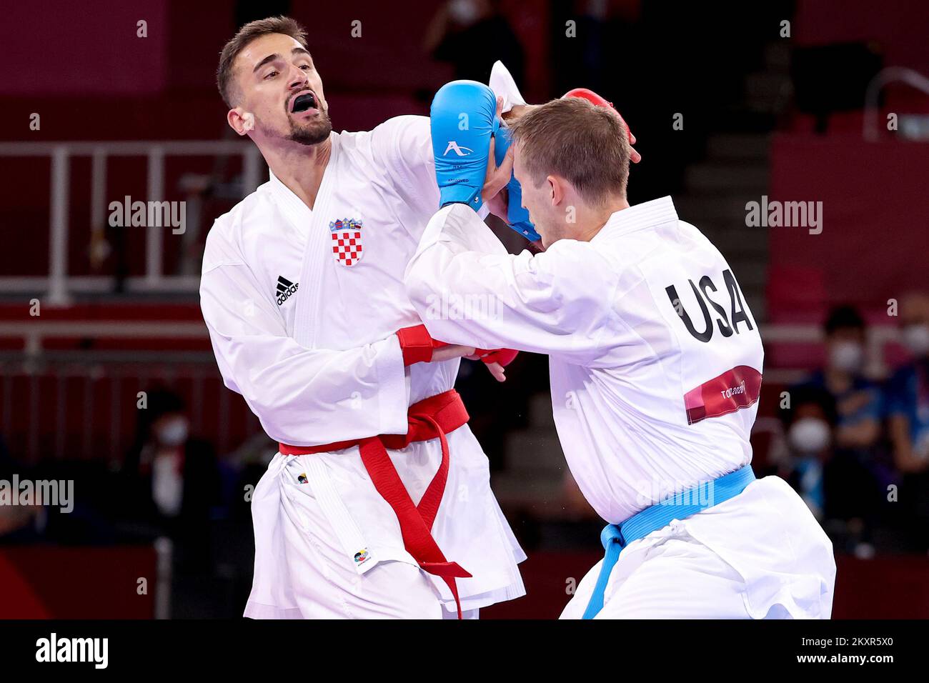 Ivan Kvesic of Team Croatia competes against Brian Irr of Team United ...