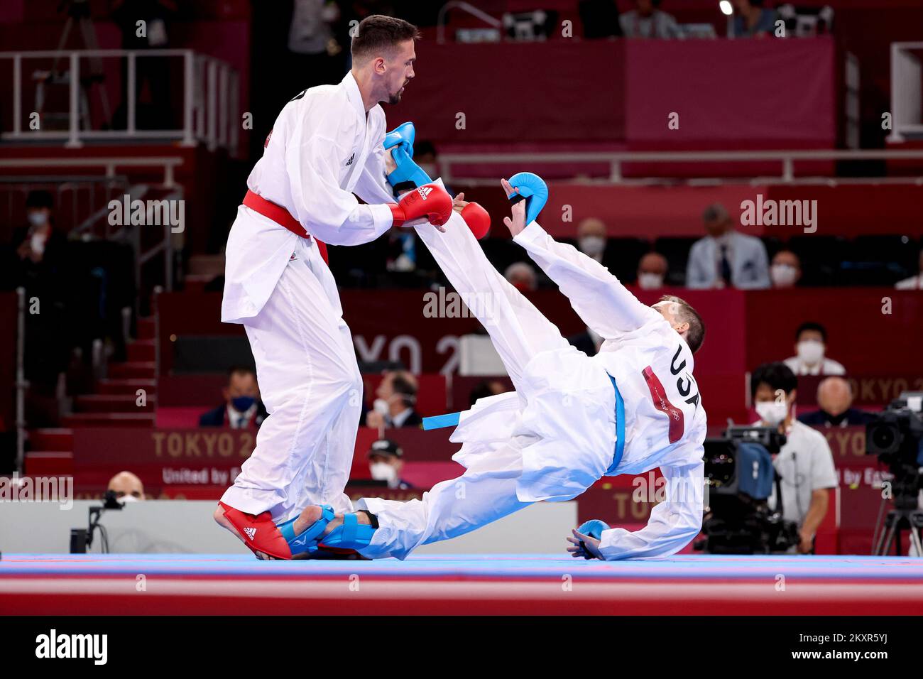 Ivan Kvesic of Team Croatia competes against Brian Irr of Team United ...