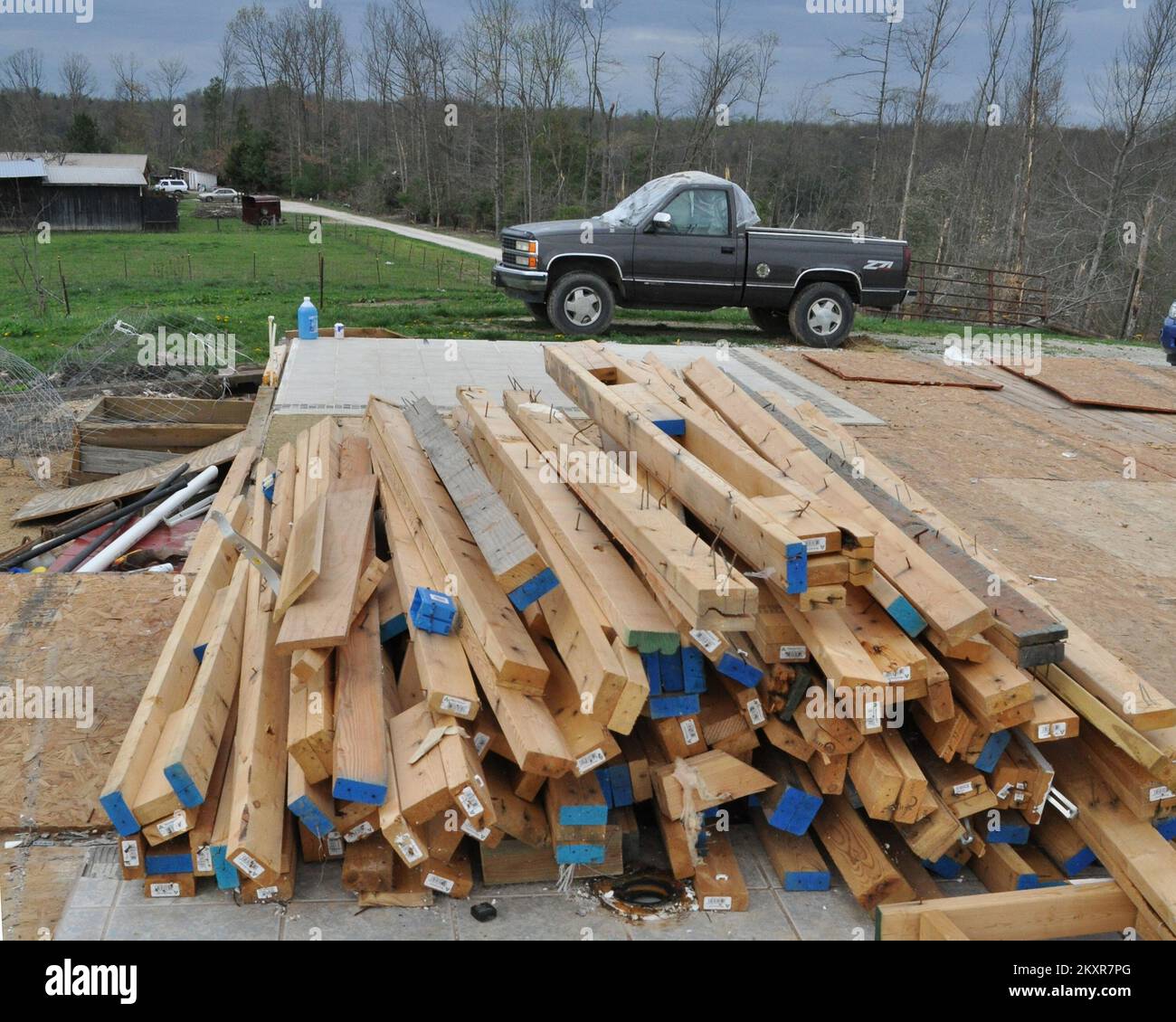 Salvaging Lumber Before Rebuilding Starts. Kentucky Severe Storms ...