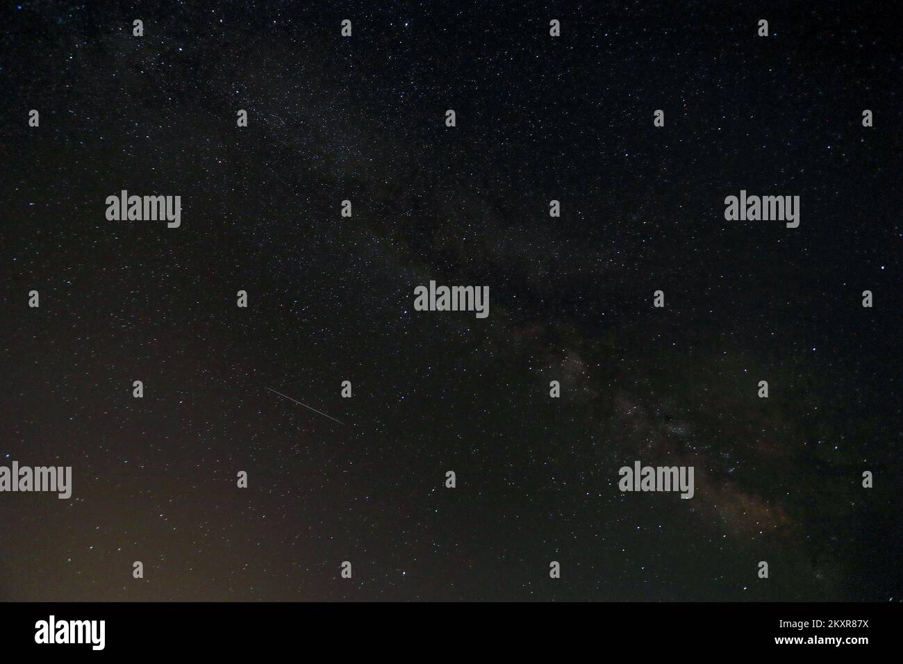 Perseids, known as the Tears of St. Lawrence are seen in the sky above ...