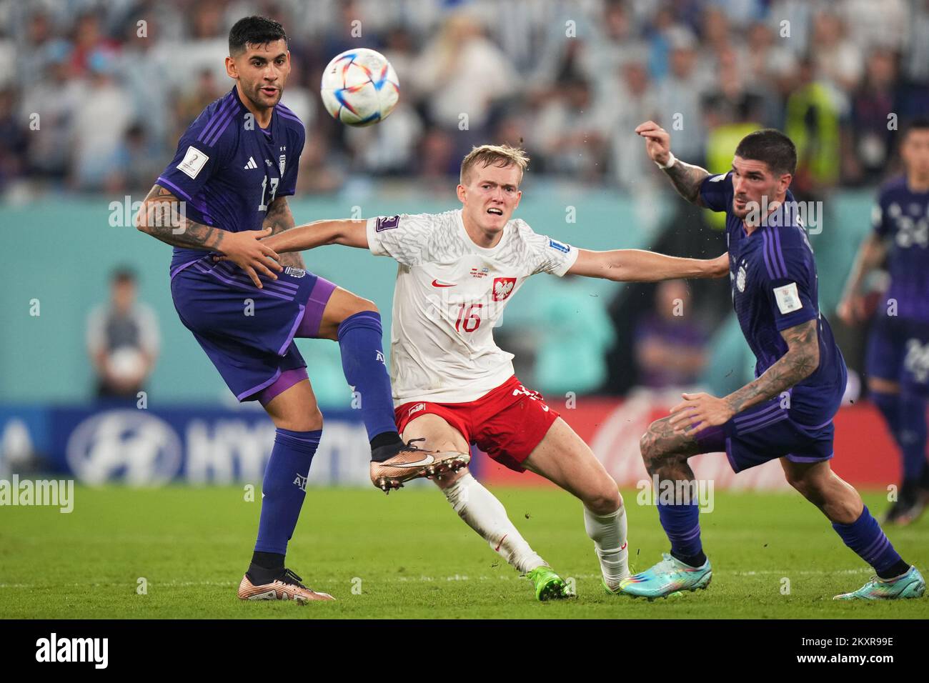Doha, Qatar. 30th Nov, 2022. David Raya of Spain and Karol Swiderski of ...