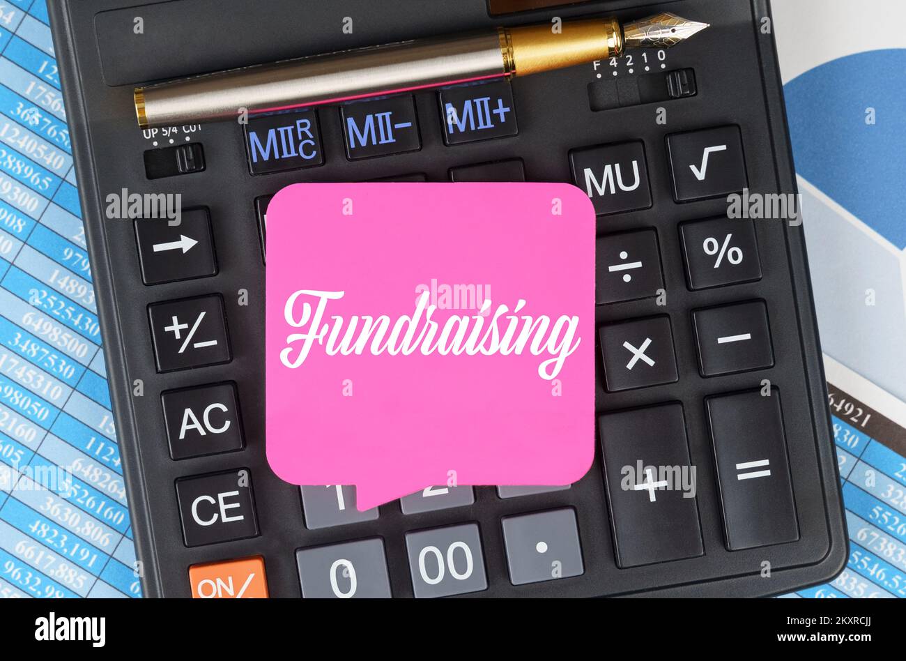 Finance and economics concept. On the desktop are charts, reports, a ...