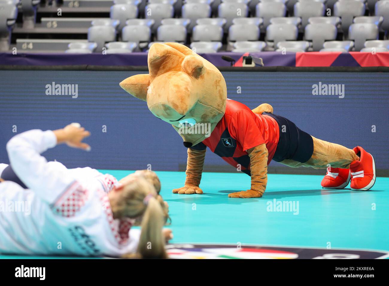 Mascot Ace warms up with the volleyball players before the CEV ...