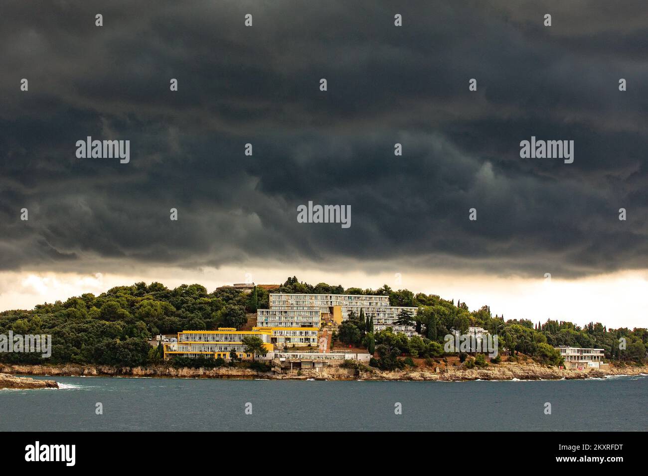Heavy rain and clouds after few weaks of heat above city of Pula ...