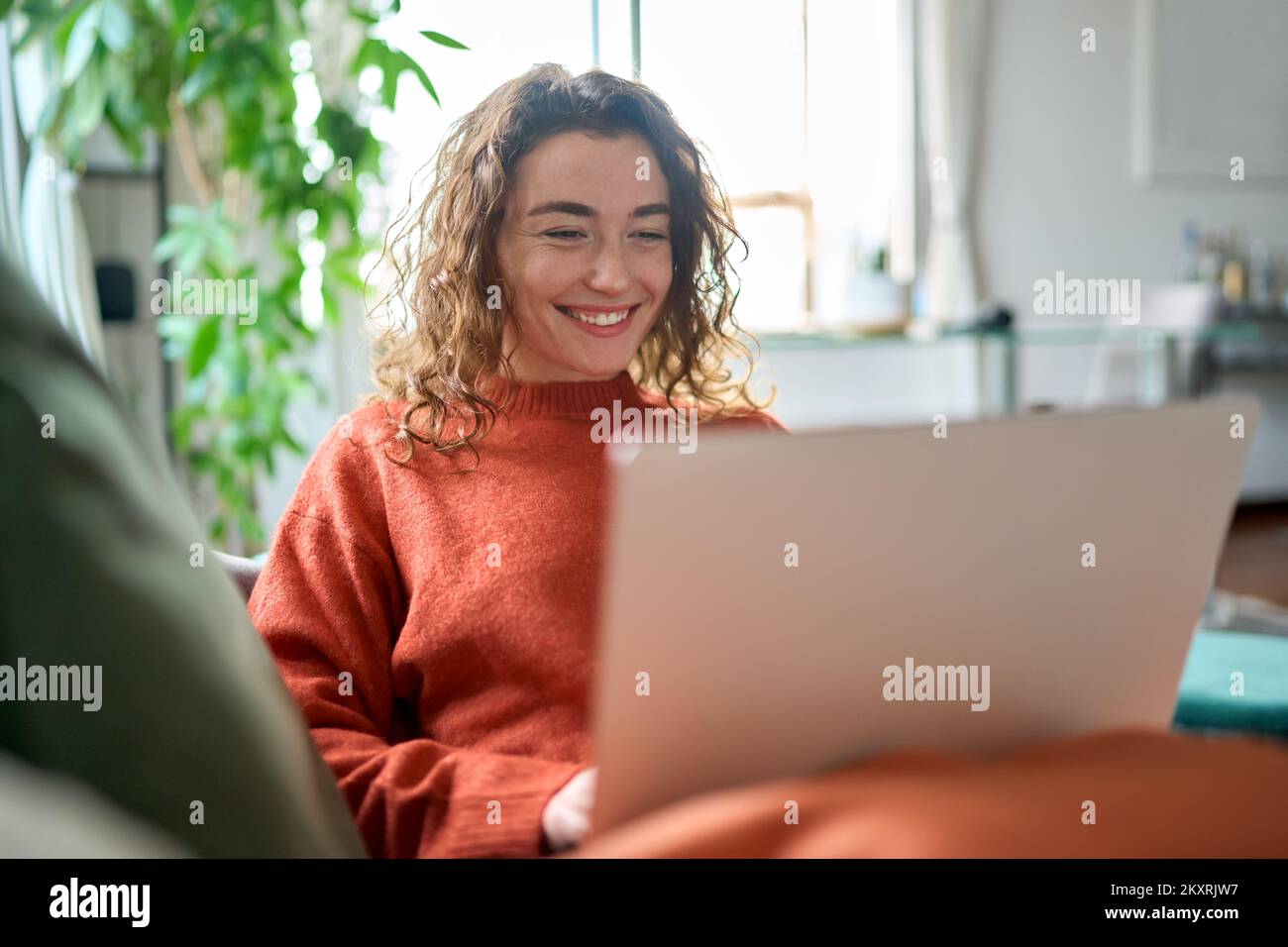 Happy person typing on laptop hi-res stock photography and images - Alamy