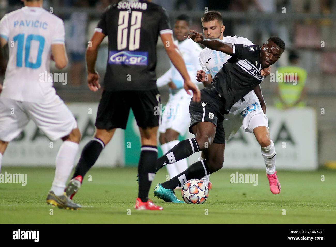 Anderson Esiti of PAOK in action against Lindon Selahi of Rijeka during ...