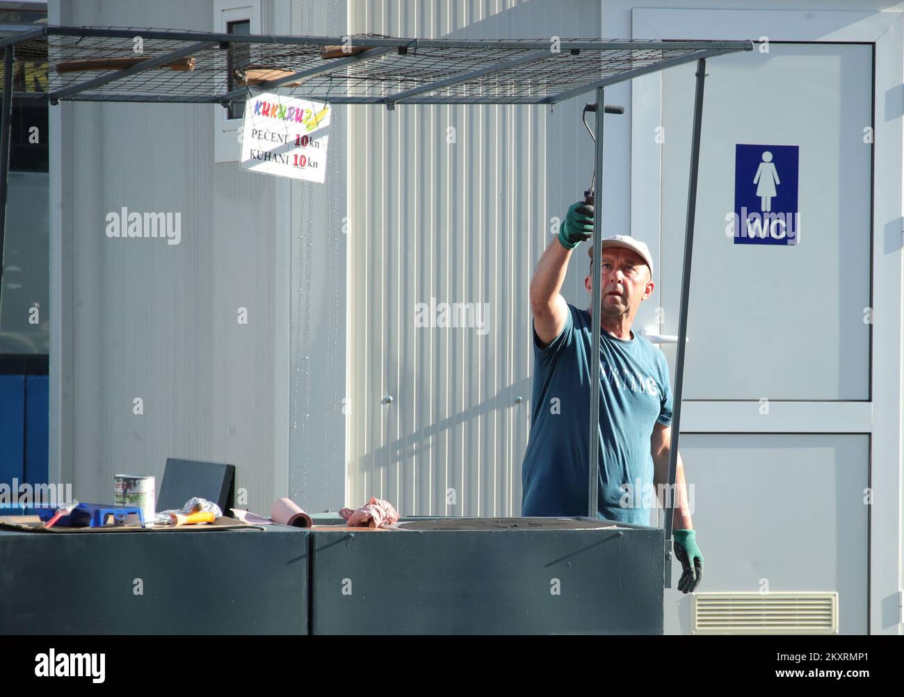 City everyday life in the center of town. Morning gymnastics-painting ...