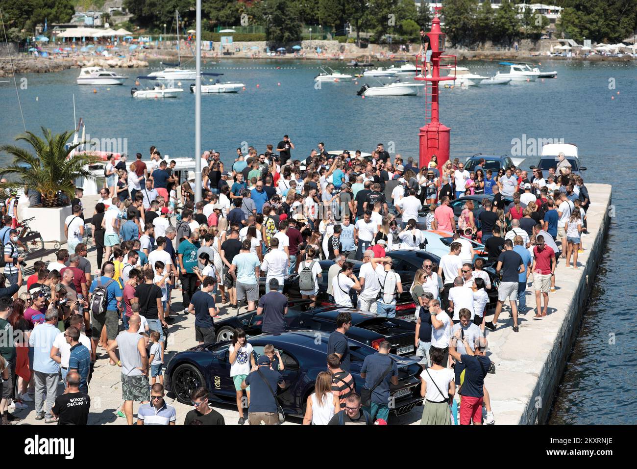 People gathered to see and photograph the cars in Opatija on September ...