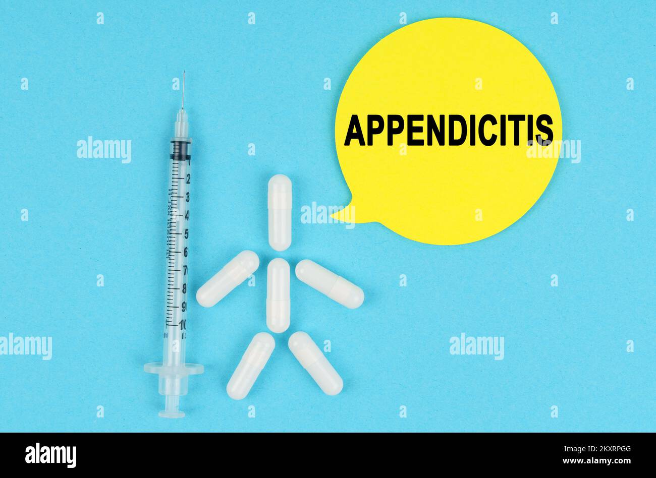 Medicine and health concept. Syringe, human figure made of pills and ...