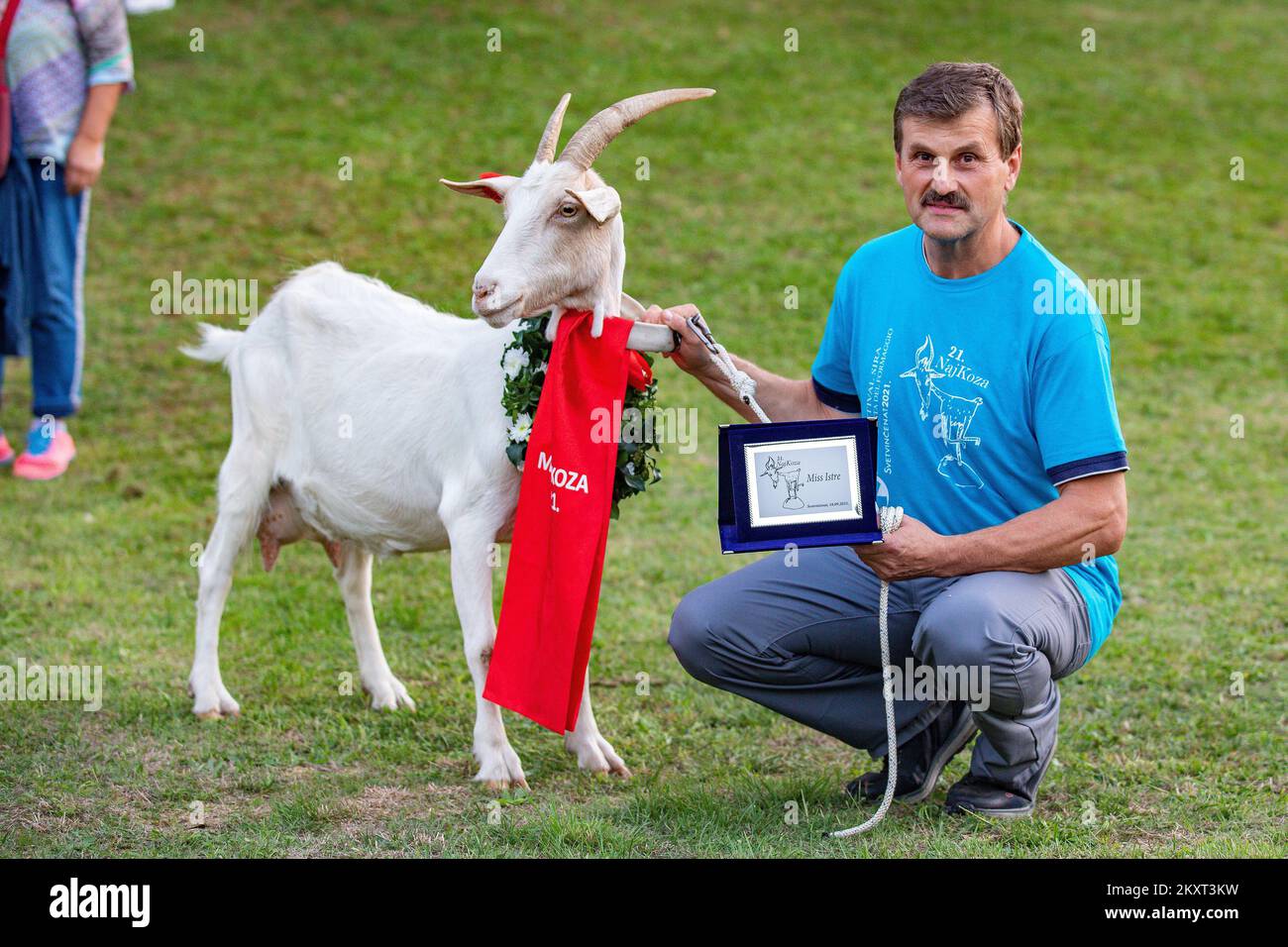 Winner goat Bila pose for a picture with owner Franko Sandric during ...