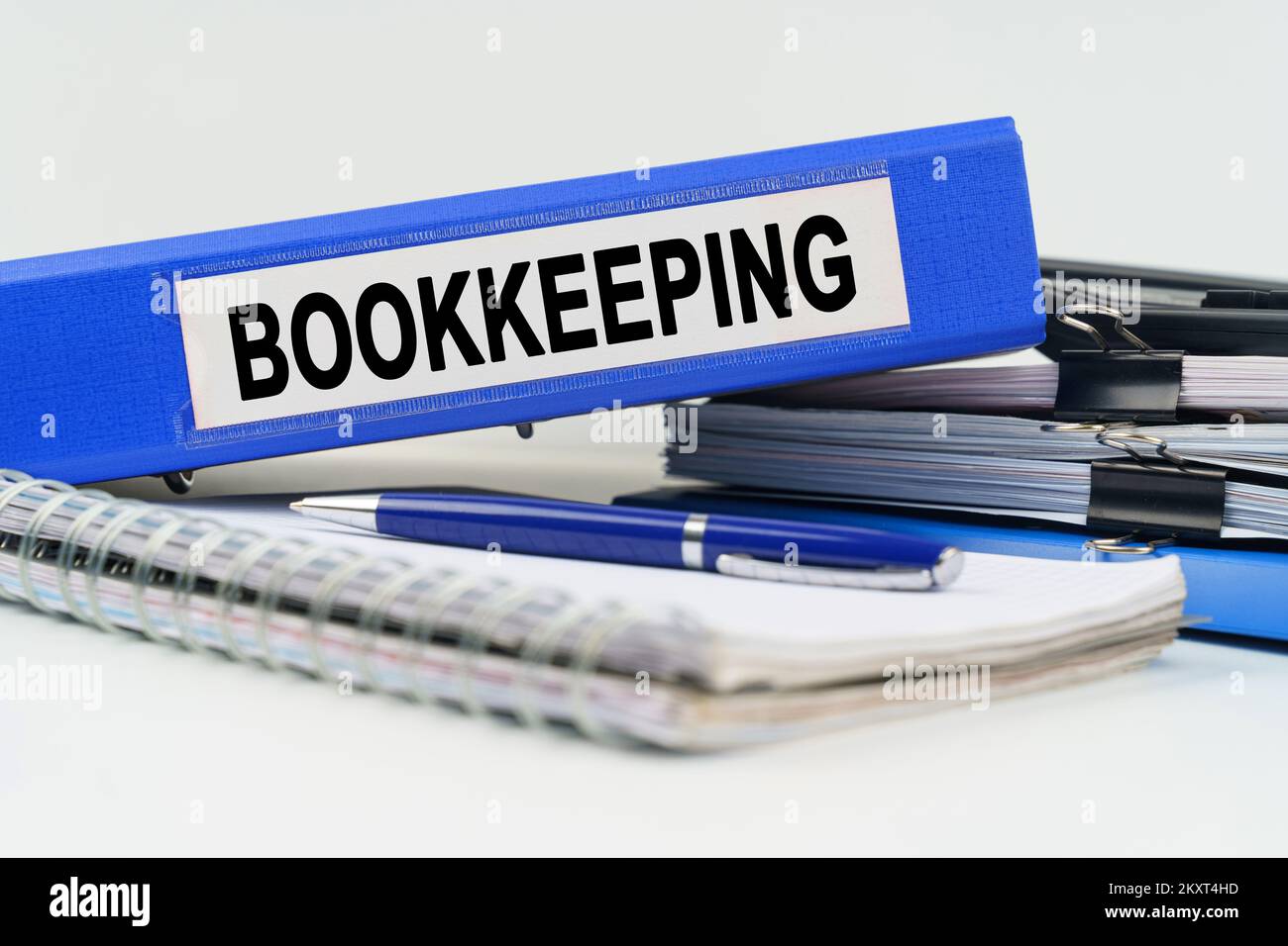 Business and finance concept. On the table are a notebook, a pen ...