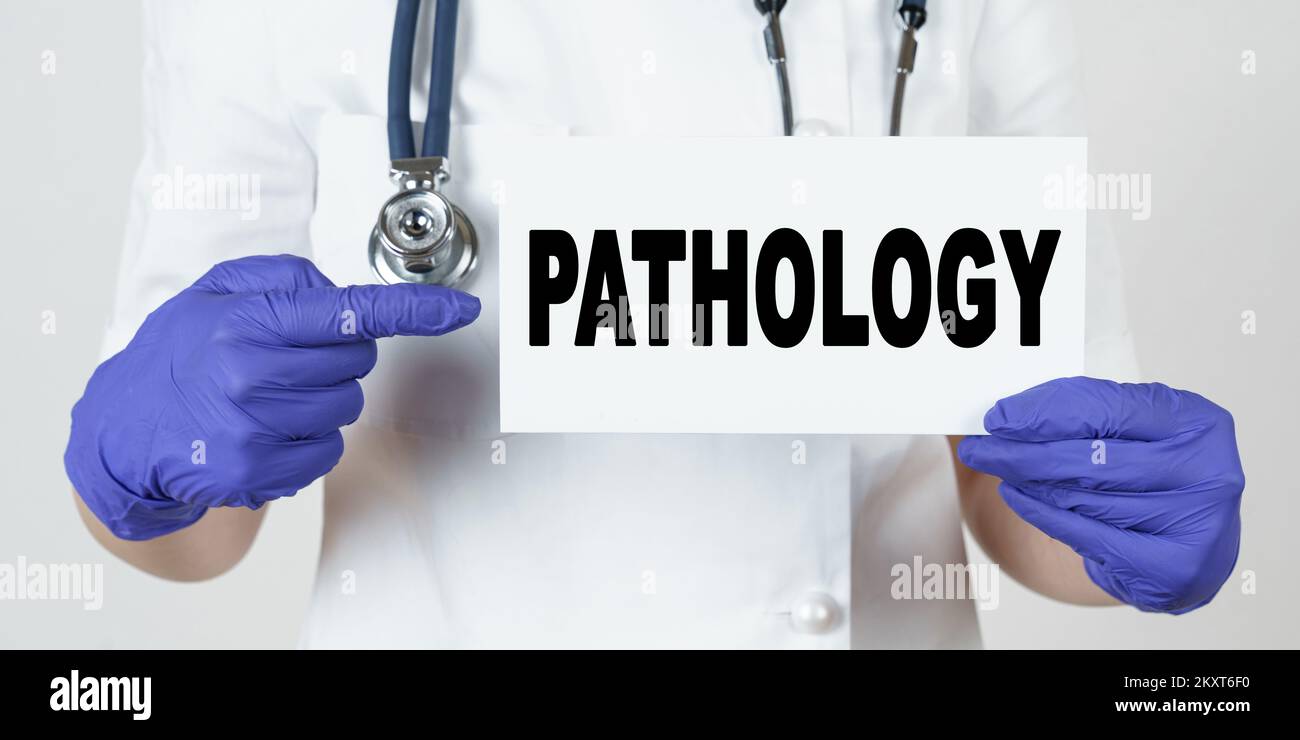 Medicine and health concept. The doctor points his finger at a sign ...