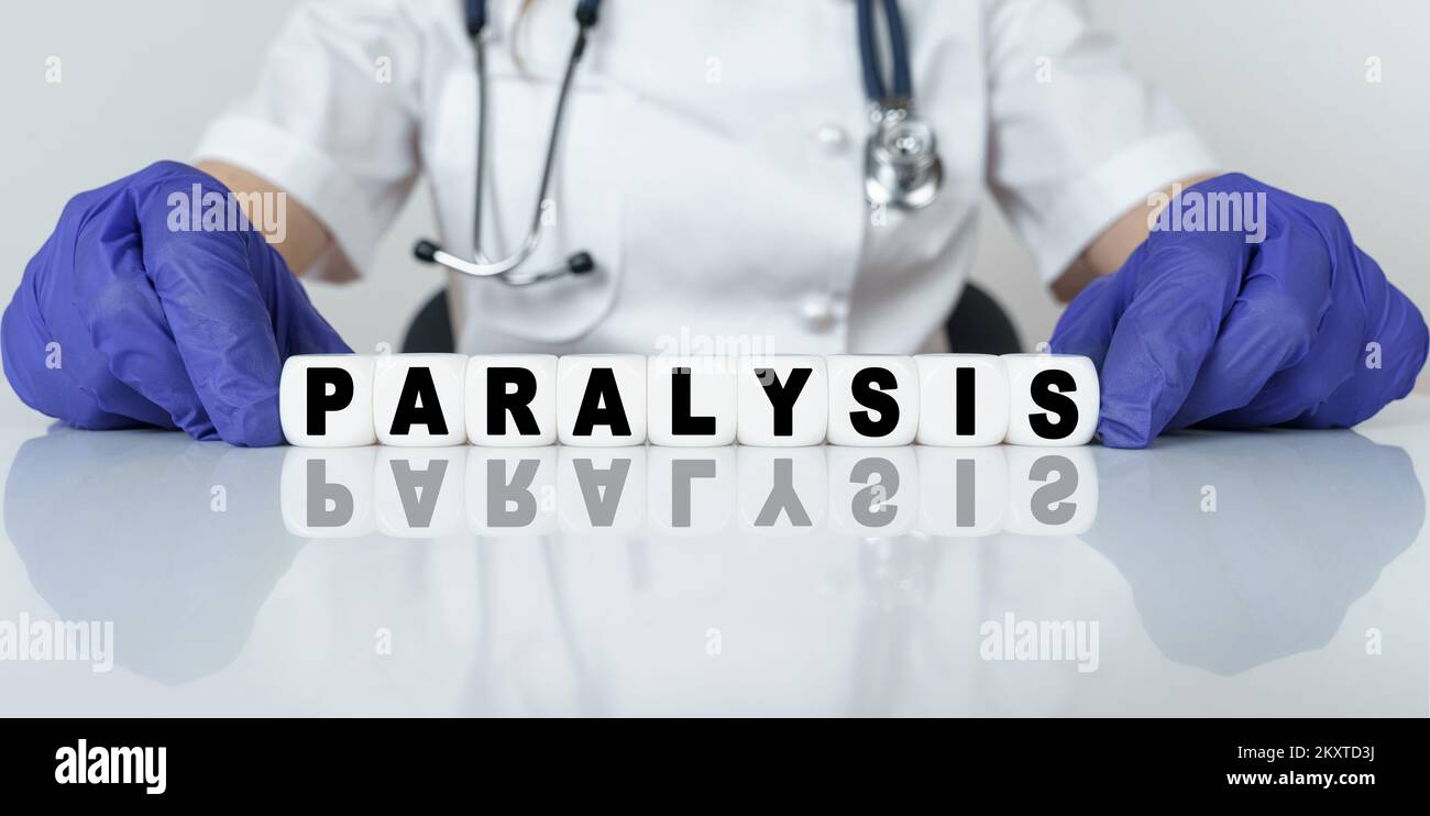 Medicine and health concept. The doctor put together a word from cubes ...