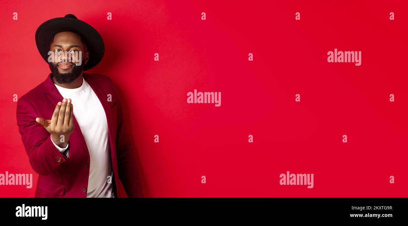 Handsome and masculine Black man asking come closer, luring to step ...