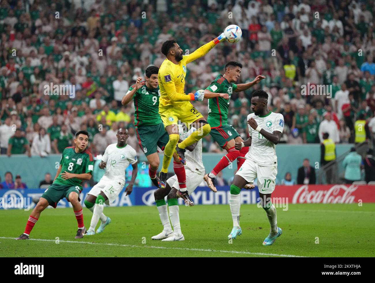 Saudi Arabia goalkeeper Mohammed Al-Owais punches clear during the FIFA ...