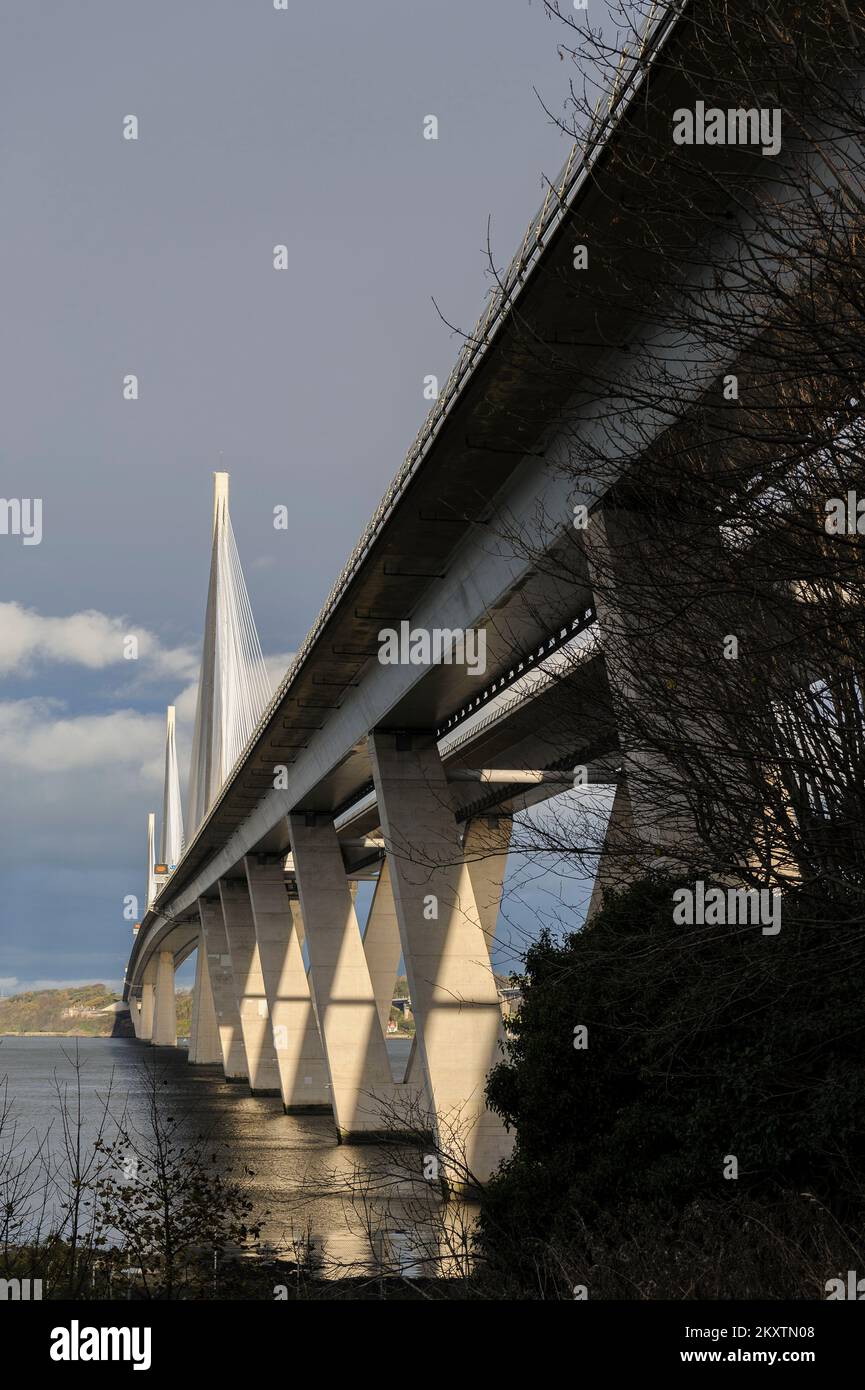 View along upstream length of Queensferry Crossing bridge across Firth ...