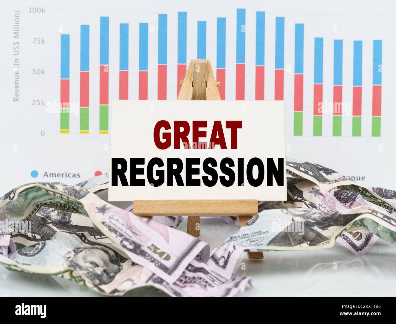 Business and finance concept. Among financial charts and money is a ...