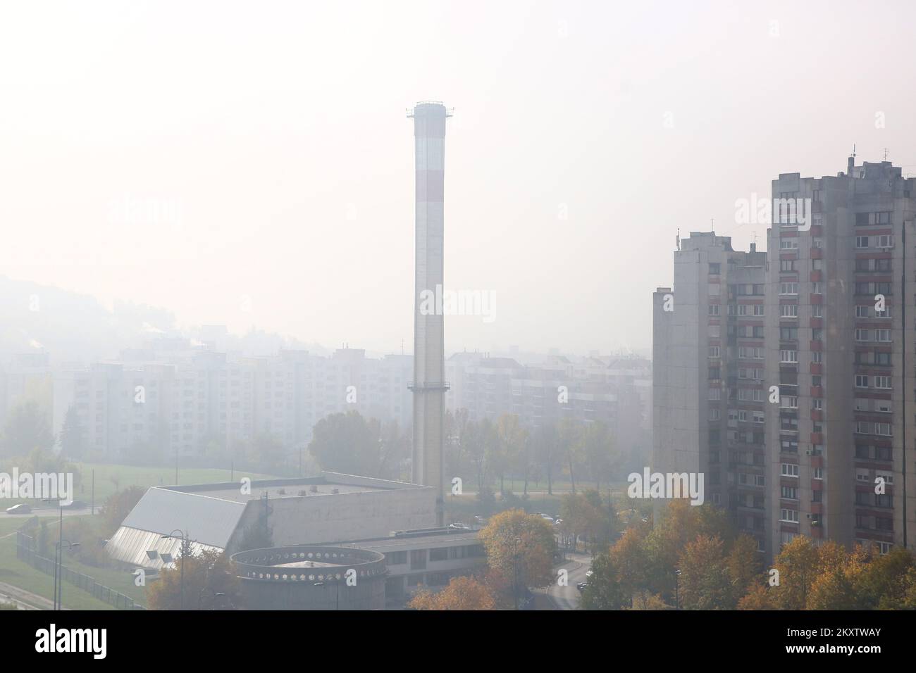 A portion of city Sarajevo is pictured during a smoggy day in Sarajevo ...