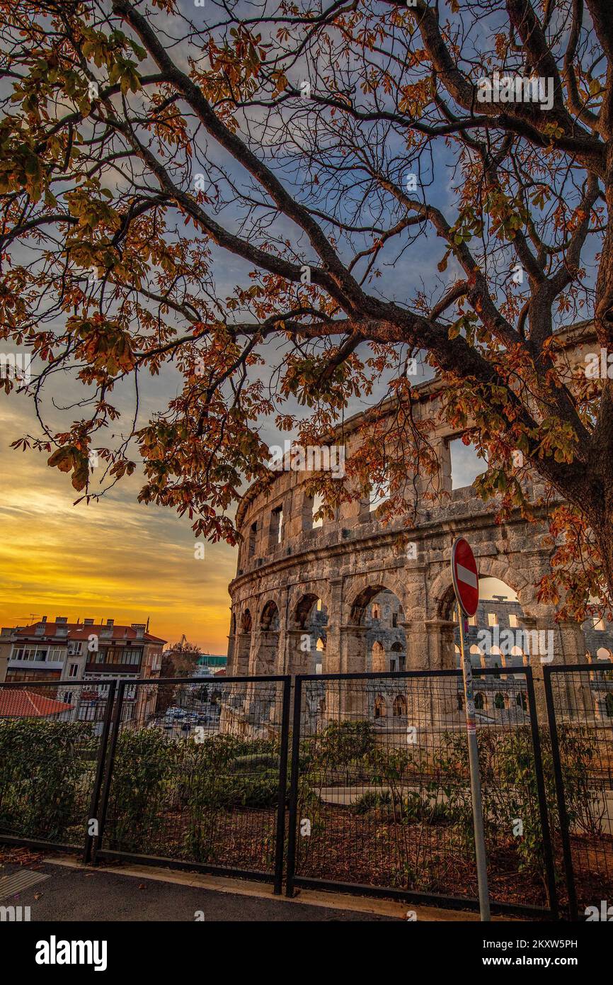 Photo taken on November 15, 2021. shows sunset above Pula Arena , in ...