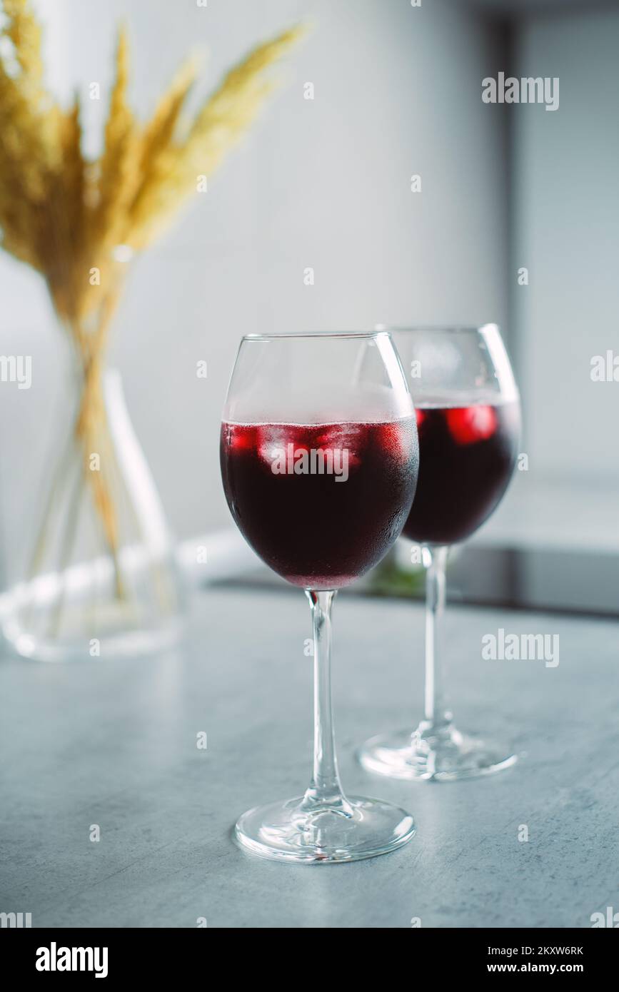 Hour glass on red hi-res stock photography and images - Alamy