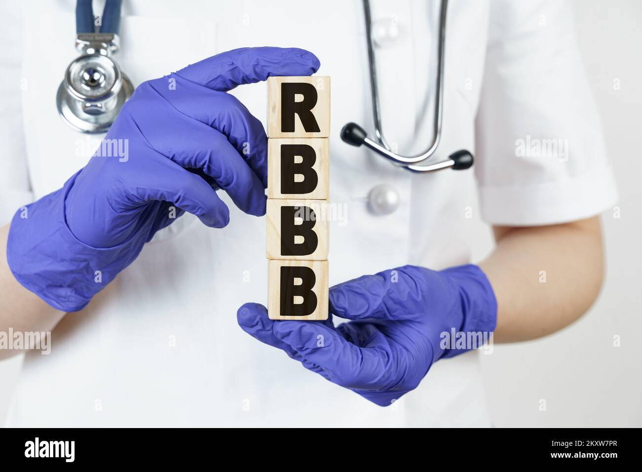 Medicine and health concept. The doctor holds cubes in his hands on ...