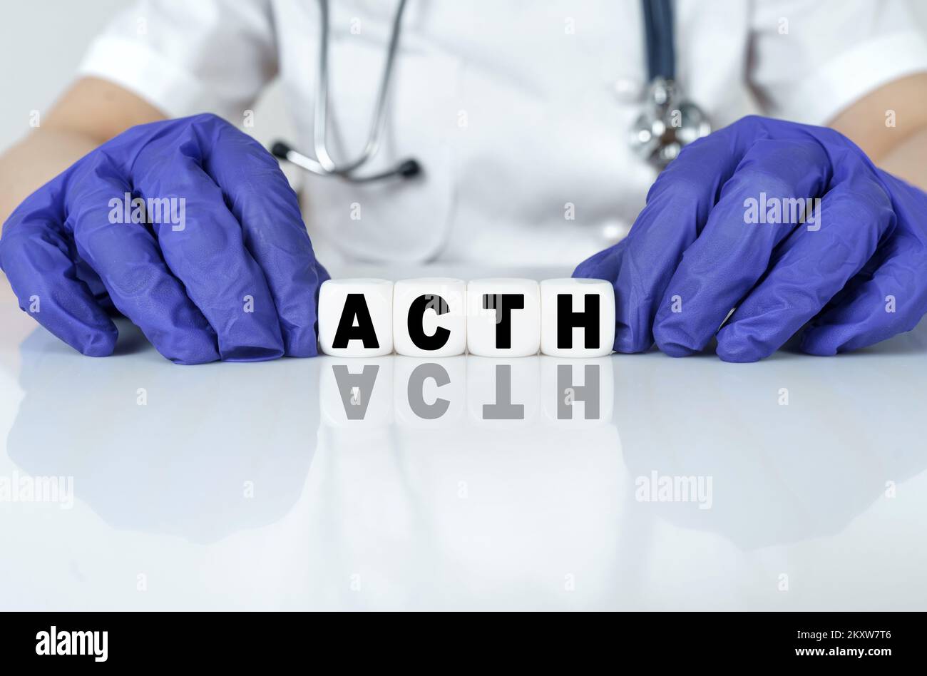 Medicine and health concept. The doctor put together a word from cubes ...