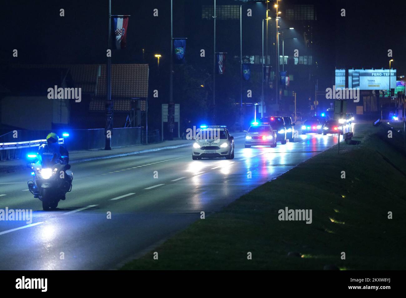 French President Emmanuel Macron, accompanied by police, is coming from ...