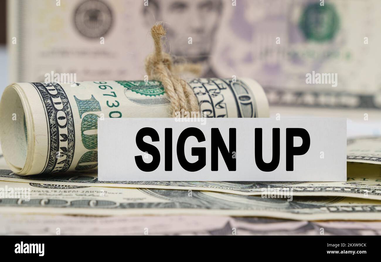 Finance and economics concept. On the table are bills, a bundle of ...