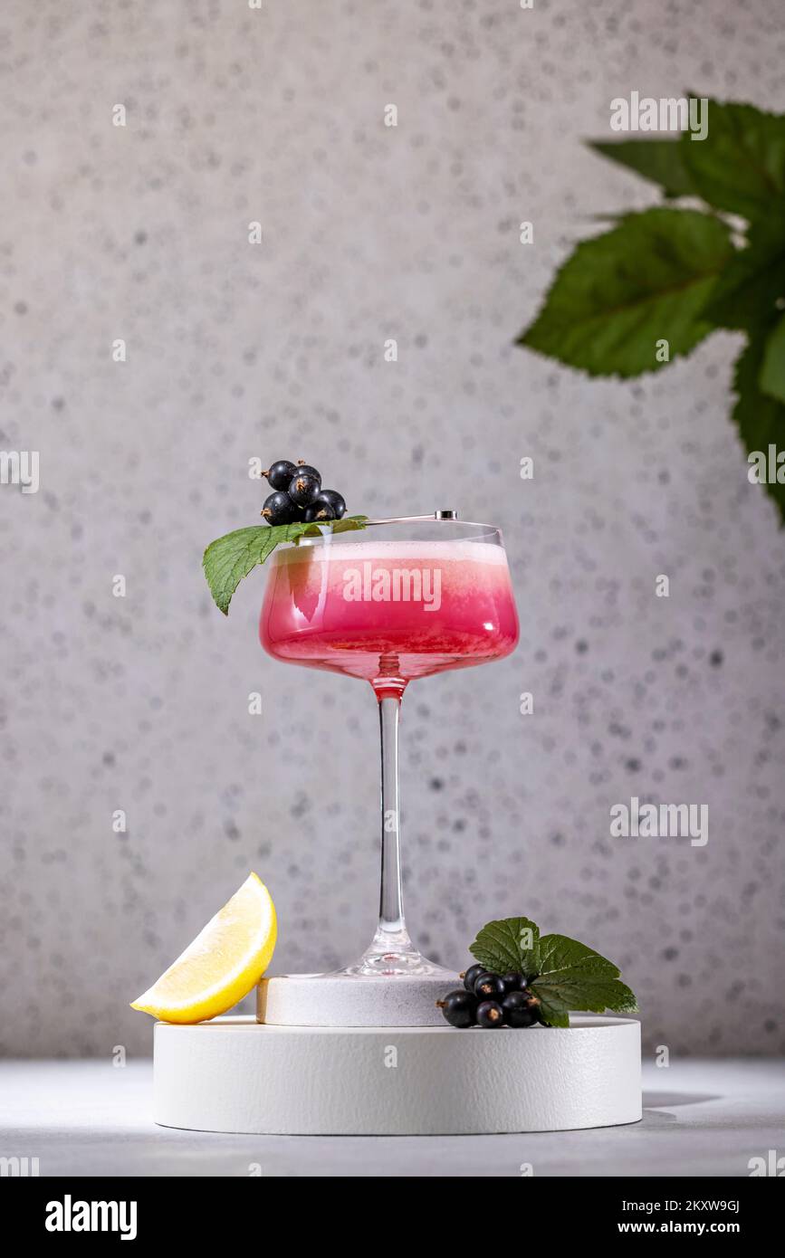 Elegant glass of Black Currant Gin Sour cocktail or mocktails ...
