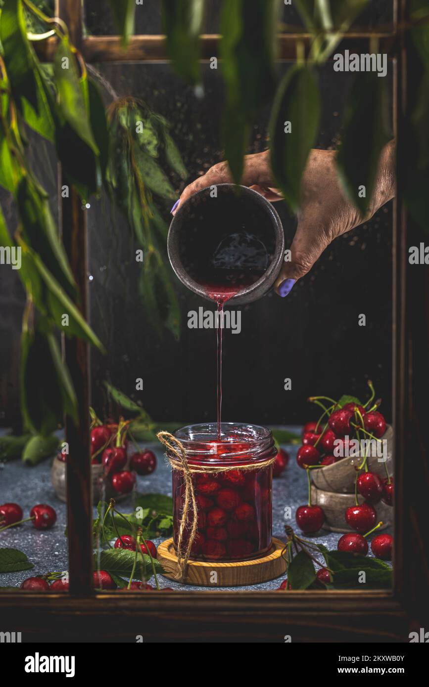 Homemade DIY natural canned red cherry jam confiture with chilli in ...