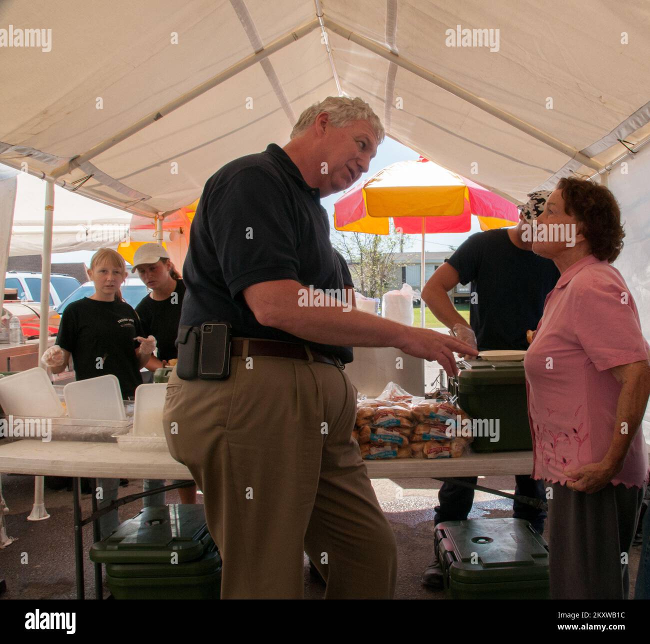 Deputy Richard Serrino talks to a Hurricane Isaac survivor in Je ...