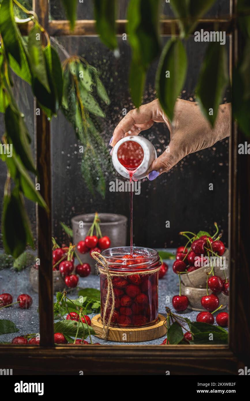 Homemade DIY natural canned red cherry jam confiture with chilli in ...