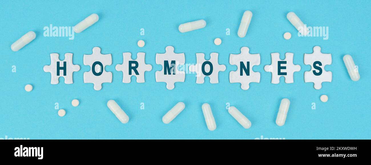 Medicine and health. On a blue background, there are pills and puzzles ...