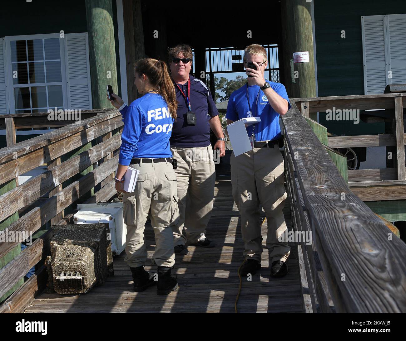 Biloxi, Miss., Oct. 2, 2012 FEMA Corps members Nate Hallgren and ...