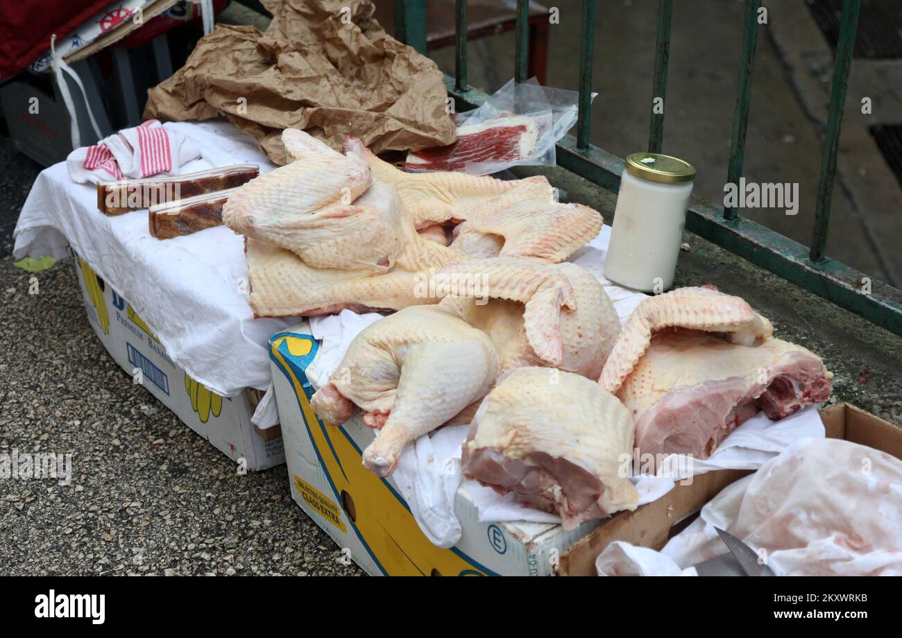 Various meat seen in the butcher shop on the main city market in ...