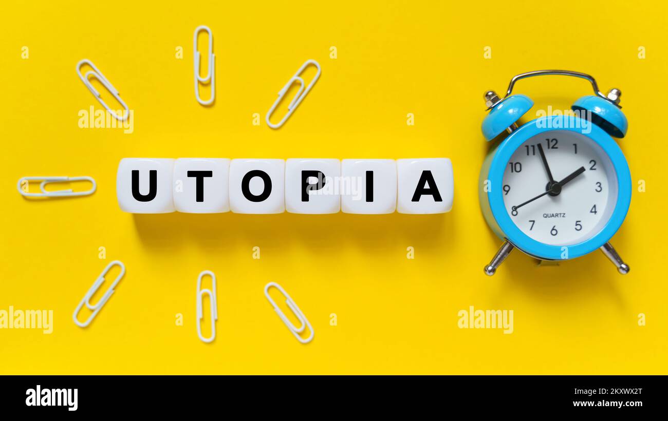 Finance and economics concept. On a yellow background, a blue alarm ...