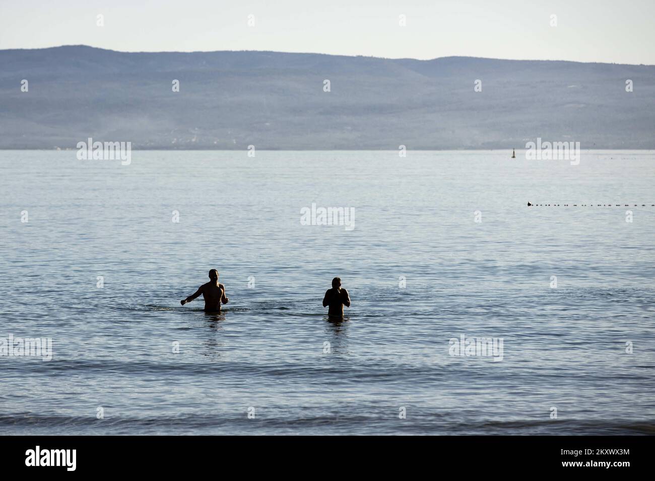 People play a traditional game of picigin during a traditonal Sylvester ...