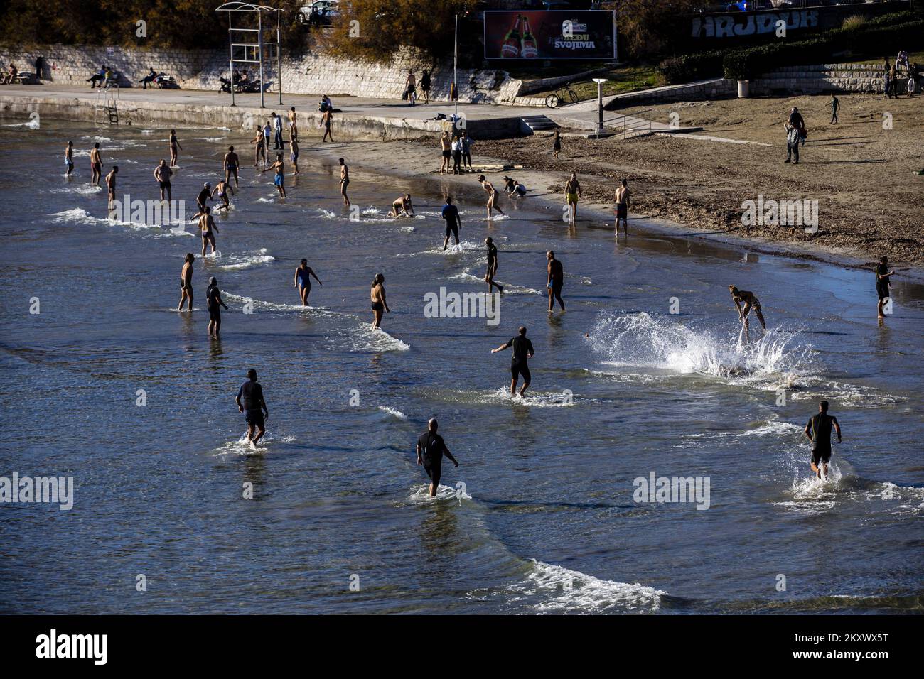 People play a traditional game of picigin during a traditonal Sylvester ...