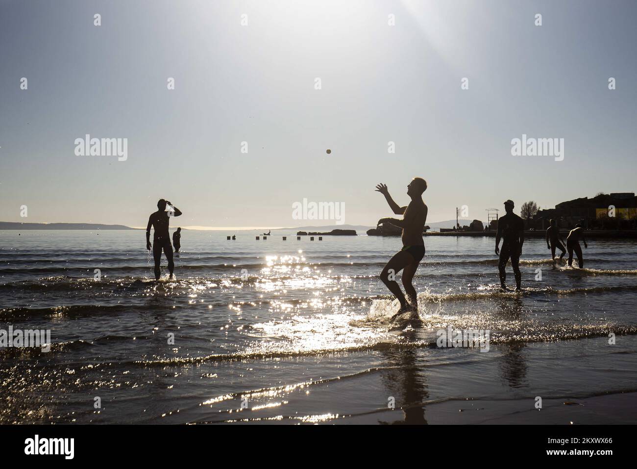 People play a traditional game of picigin during a traditonal Sylvester ...