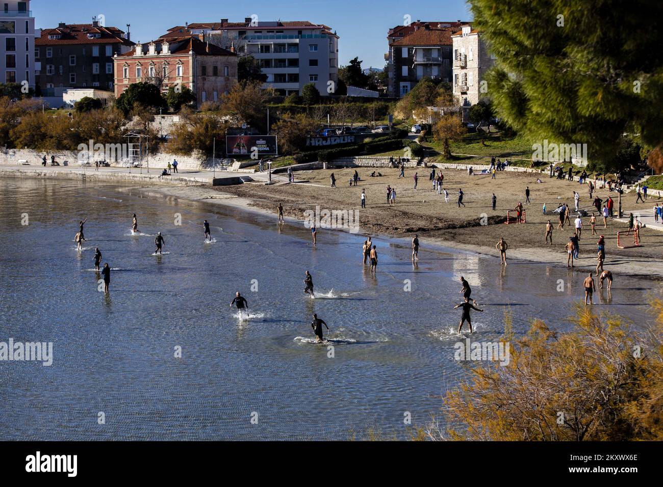 People play a traditional game of picigin during a traditonal Sylvester ...
