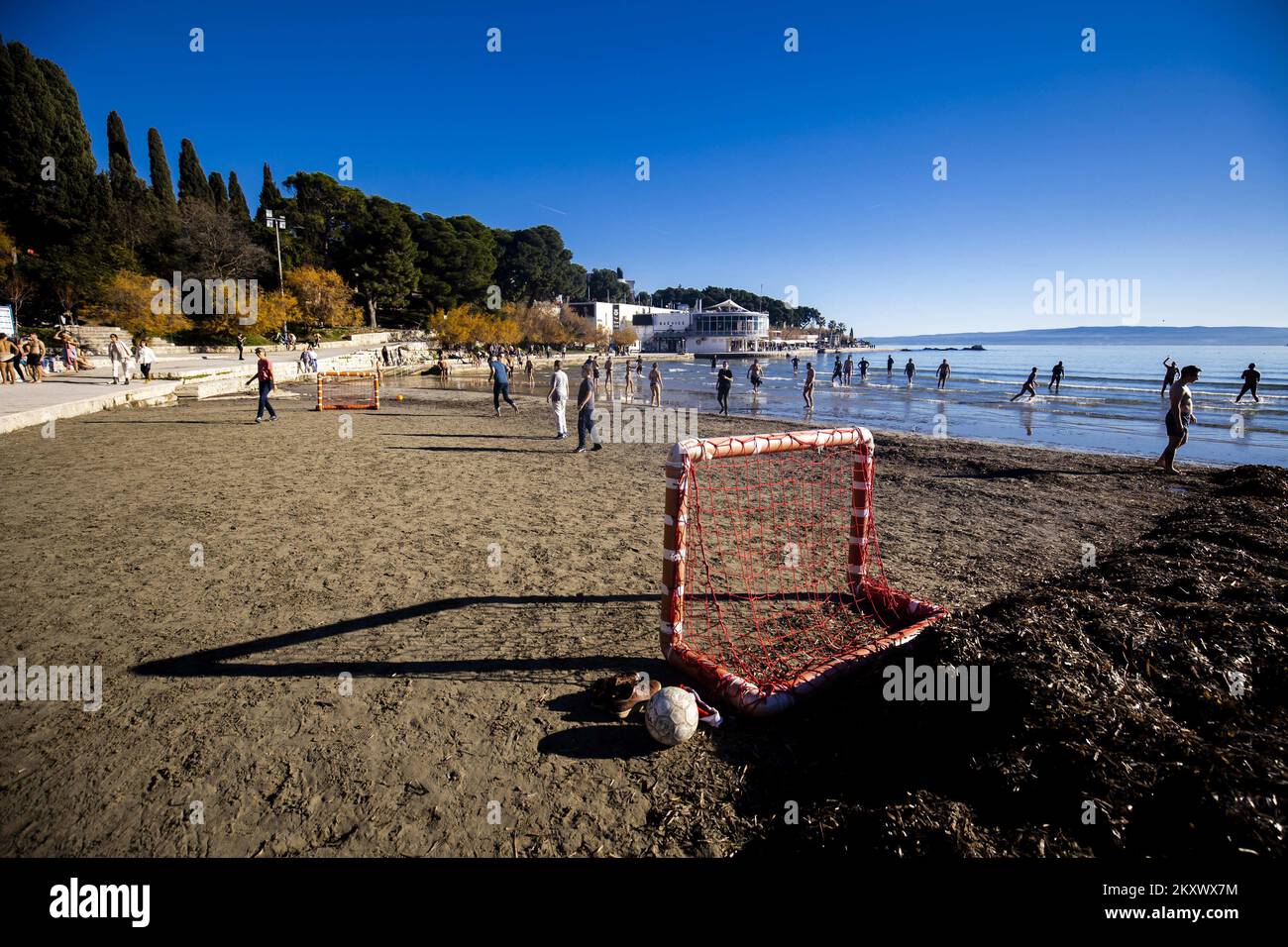 People play a traditional game of picigin during a traditonal Sylvester ...